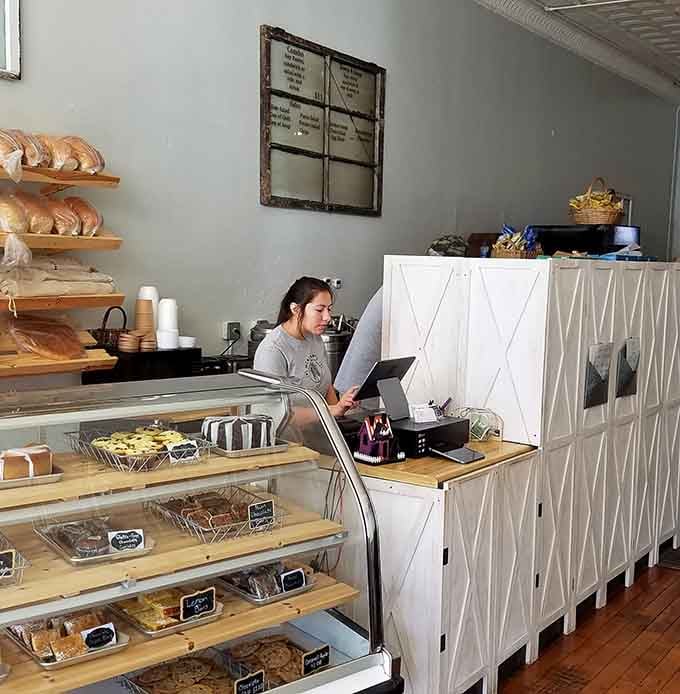 Fresh-baked goods displayed like edible art, daring you to leave without adding something sweet to your order today.