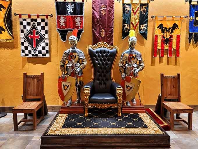 The royal throne sits flanked by armored guards and colorful banners, where the kingdom's fate gets decided tonight.