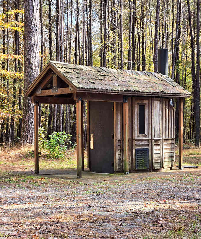 Even the outbuildings here look like they've been standing guard over these woods for generations past.
