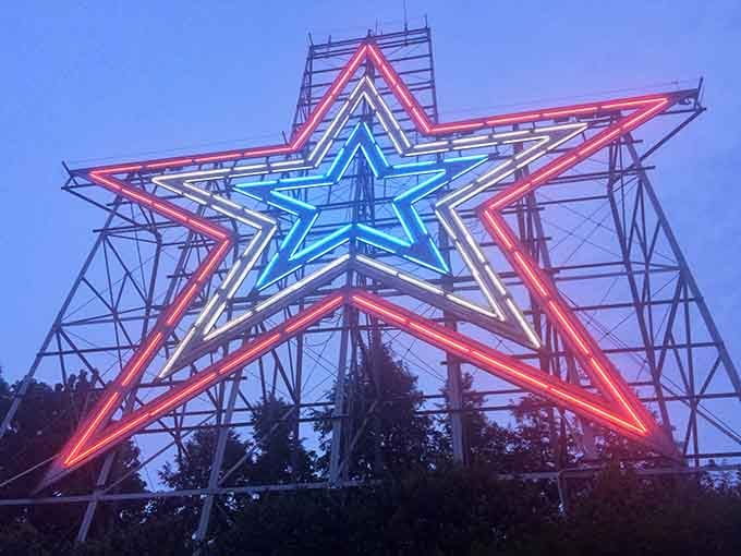 Patriotic colors illuminate the star for special occasions, turning this landmark into a celebration visible across town.