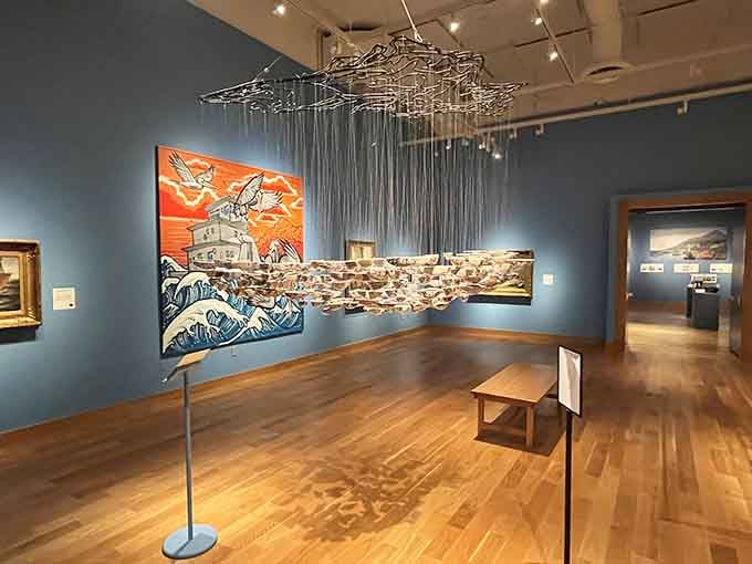 Suspended sculptures catch light like schools of fish, turning negative space into mesmerizing maritime poetry.