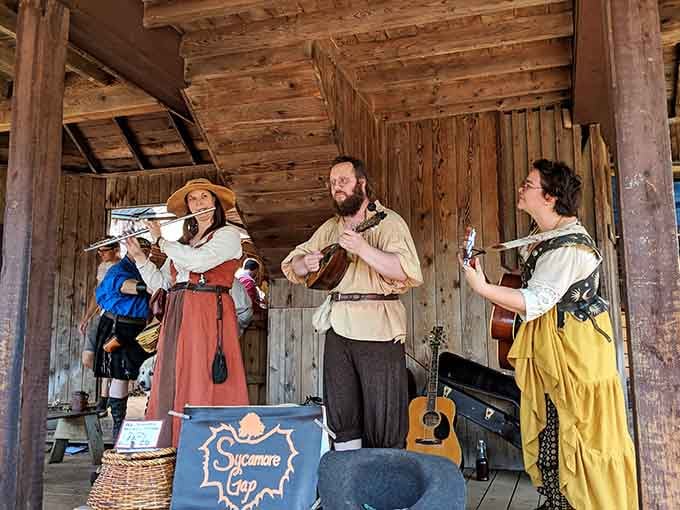 Musicians in period costume fill the air with melodies played on instruments your history teacher mentioned.