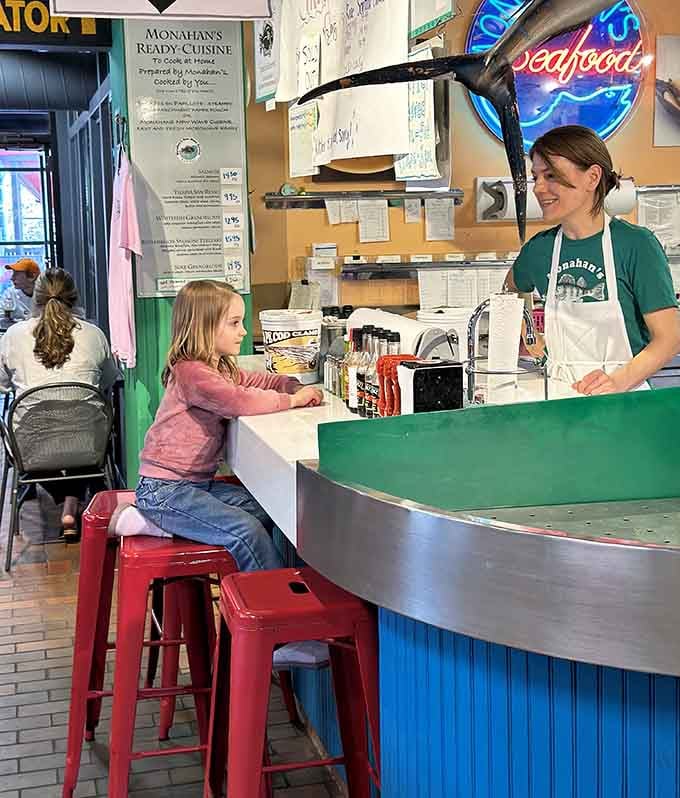 Counter seating puts you front and center for the seafood show, where every order is theater.
