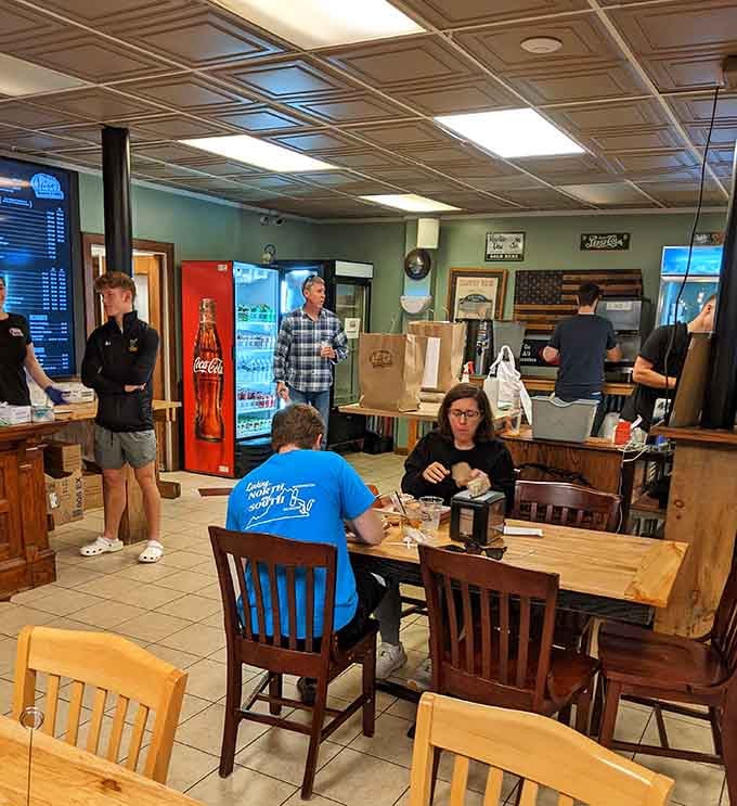 Real people enjoying real barbecue in a space that feels like your favorite uncle's backyard cookout went pro.
