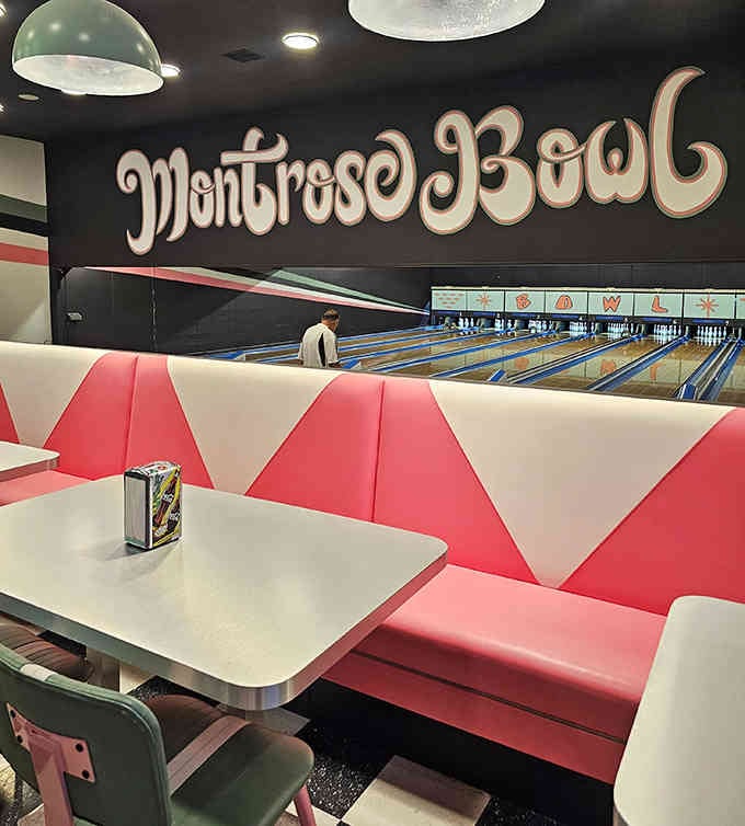 Retro booth seating with a view of the lanes means you never miss the action.
