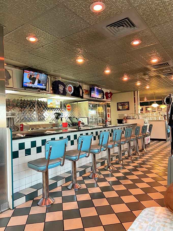 Those turquoise counter stools are calling your name, offering front-row seats to the greatest breakfast show on earth.