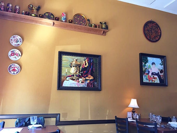 Decorative plates and traditional artwork adorning the walls remind you this isn't just dinner, it's a cultural experience.