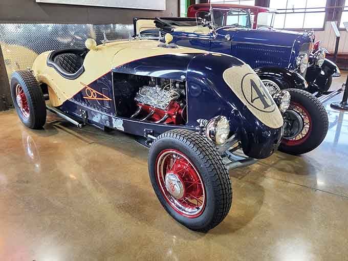 Custom hot rod swagger meets vintage racing spirit in this cream and navy speedster that probably scared its original driver silly.