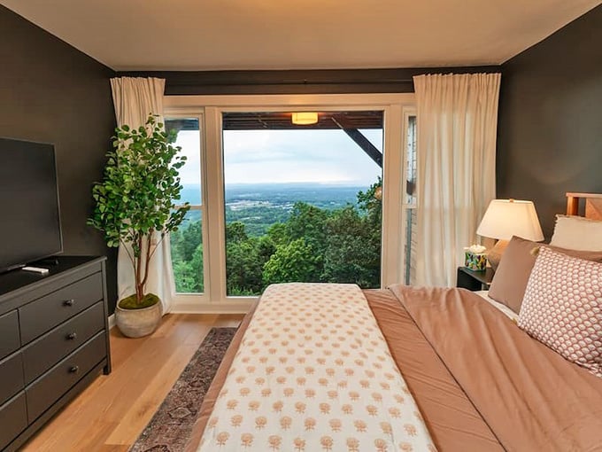 Windows framing layered mountain vistas turn bedtime into the best show you'll ever watch nightly.