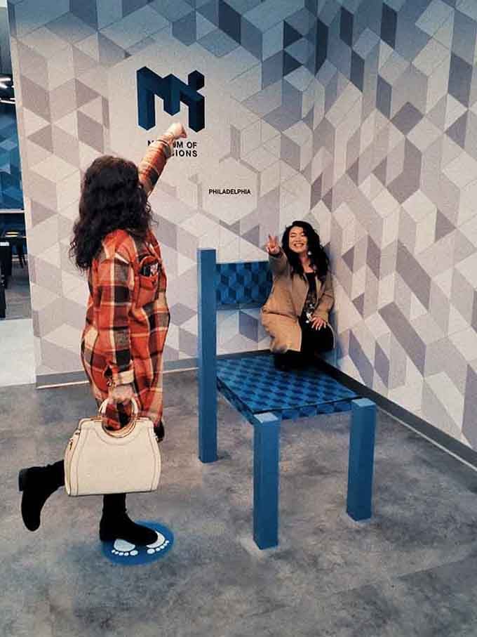 That chair looks perfectly normal until you realize someone's sitting on it while appearing to float in mid-air. Witchcraft.