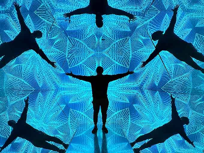 Multiple versions of you stretch into infinity, which is either deeply philosophical or just really good mirror placement.