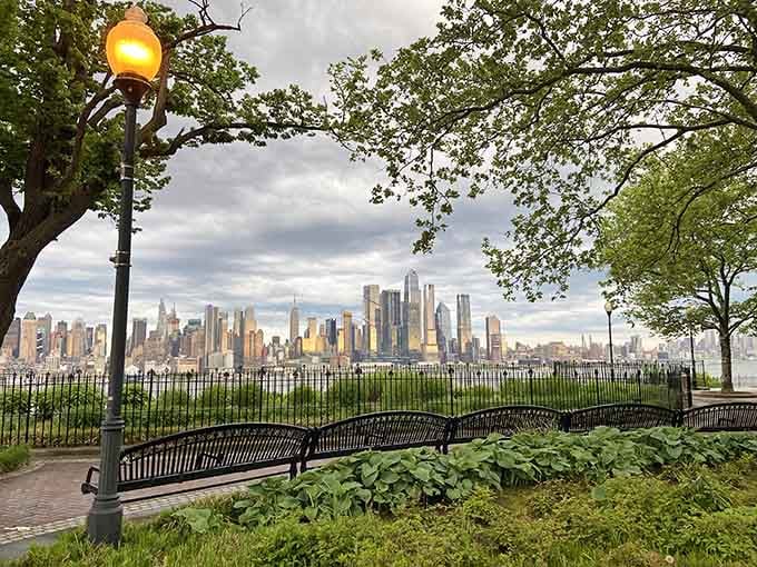 Hamilton Park's benches offer front-row seats to the greatest skyline view that technically belongs to your neighbor across the river.
