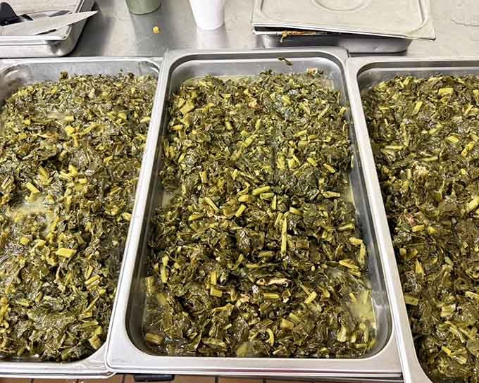 Collard greens cooked low and slow, proving that vegetables can be absolutely irresistible with proper preparation.