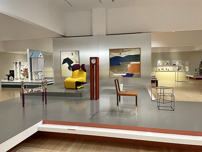 Mid-century modern pieces create a living room vignette where every chair tells a different design story.