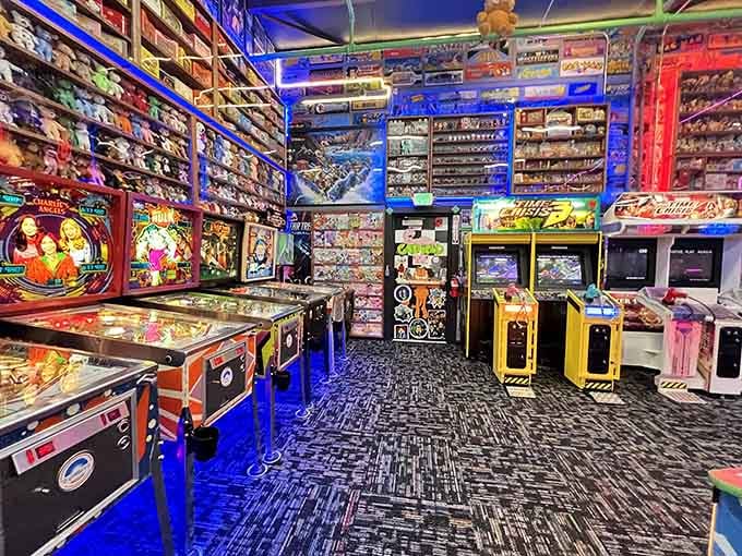 Another angle reveals the stunning depth of this collection, with vintage pinball tables stretching into the distance.