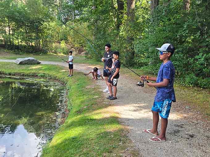 Fishing spots where patience meets possibility, and kids learn that not all entertainment requires a screen or batteries.