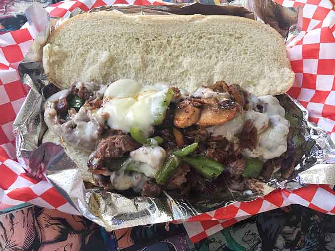 This Philly-inspired creation oozes with cheese and grilled goodness, demanding your full attention and several napkins.