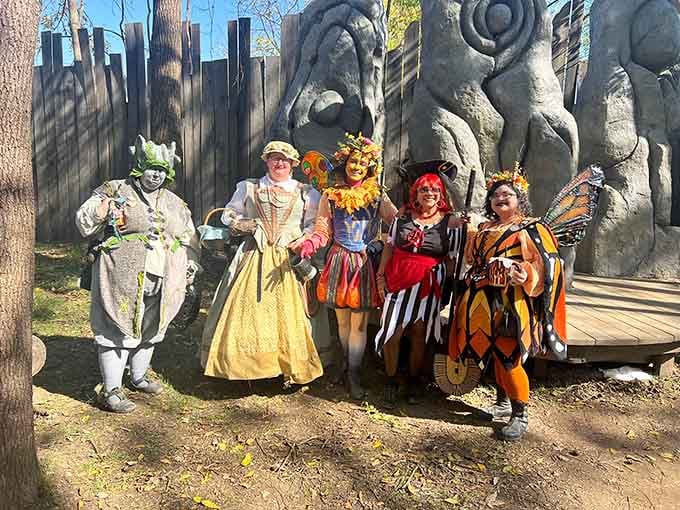 Costumed characters pose together like the cast photo from history's most colorful yearbook committee meeting.