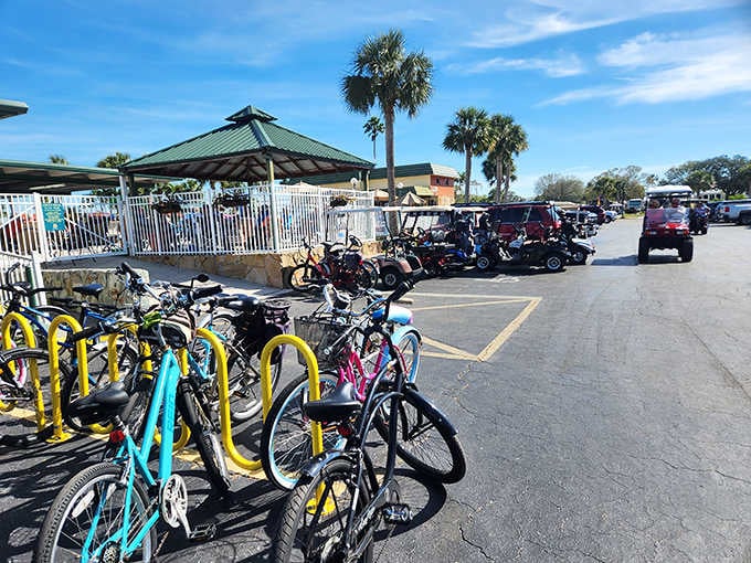 Golf carts and bikes line up like a colorful parade, ready to transport you around this massive property.