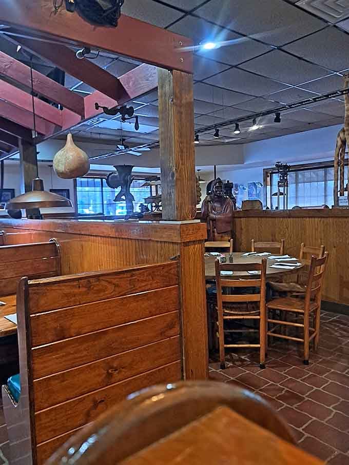 Wooden booths and brick floors create an atmosphere where comfort food feels right at home.