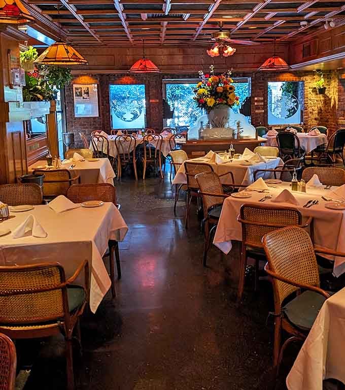 Wood paneling and brick walls create that old-world charm you can't fake with trendy industrial design.