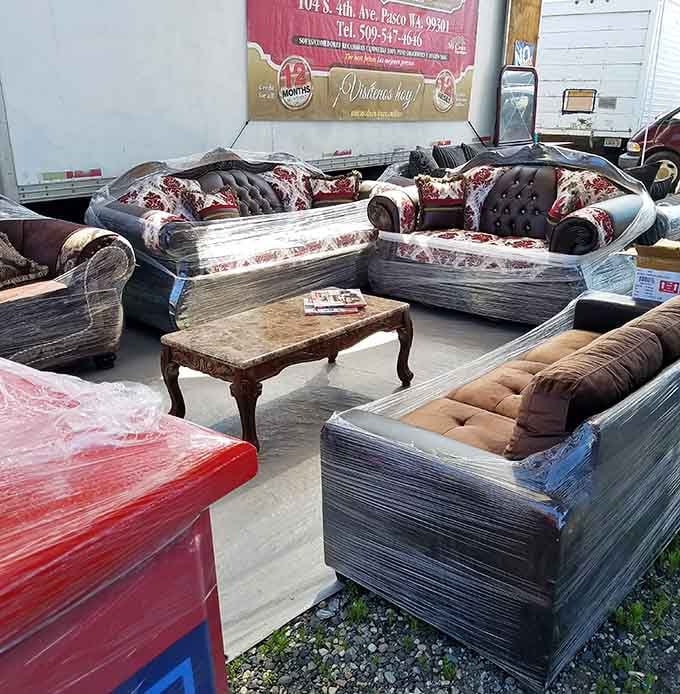 Furniture wrapped and ready, because sometimes your living room needs a flea market makeover immediately.