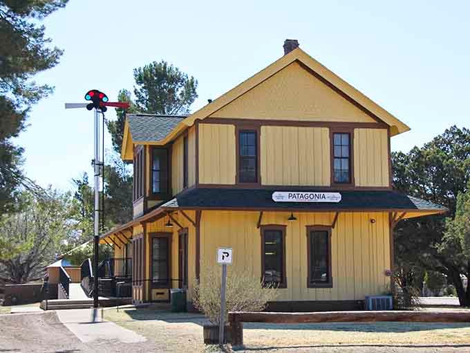 The historic railroad depot stands as a yellow sentinel to Patagonia's transportation past and architectural preservation efforts.