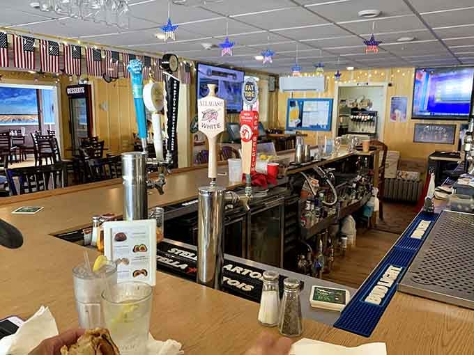 The well-stocked bar with draft taps and flat screens creates the perfect sports-watching headquarters.