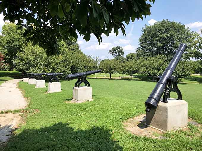 Historic cannons line the hill, silent sentinels reminding visitors that this peaceful park once stood ready to defend the city.