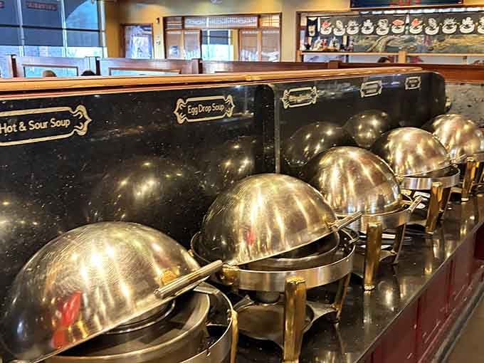 Those gleaming soup tureens promise warmth and comfort, ready to complement whatever else lands on your plate today.