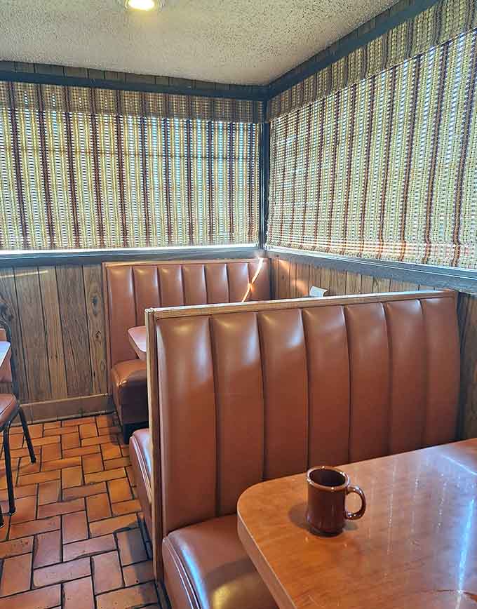 Bamboo shades and vinyl booths creating an atmosphere that feels like visiting your coolest aunt's house.