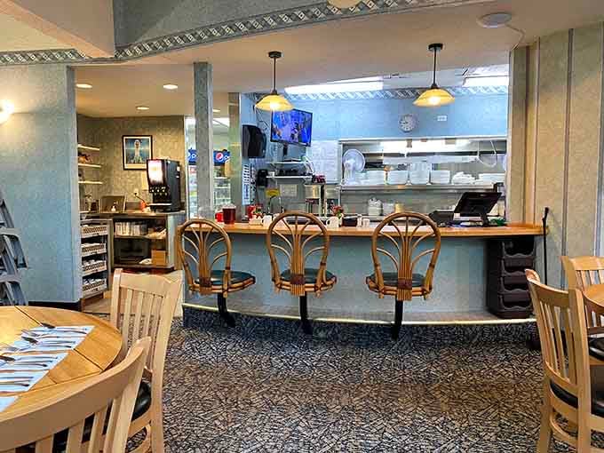 Counter seats offer front-row access to the breakfast theater, where every plate tells a delicious story worth watching unfold.