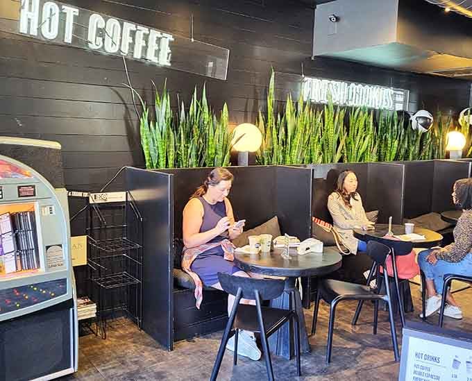 Real people enjoying real coffee in a real coffee shop, living their best caffeinated lives one sip at a time.