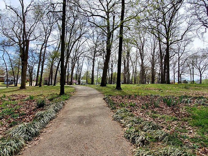 Tree-lined walking paths invite leisurely strolls through parks that don't require fighting crowds or paying admission fees.