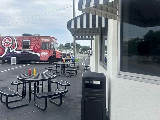 Even the outdoor seating maintains that no-frills charm, perfect for enjoying affordable burgers under actual Indiana skies.