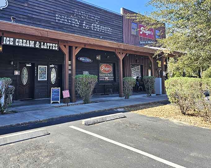 The welcoming storefront promises good things inside, with parking spaces ready for hungry travelers and local regulars.