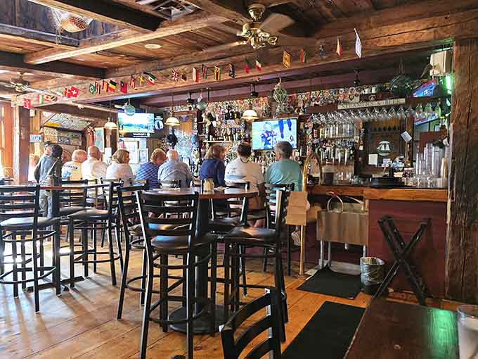 The bar area buzzes with that perfect energy where everyone's a regular, even on their first visit.