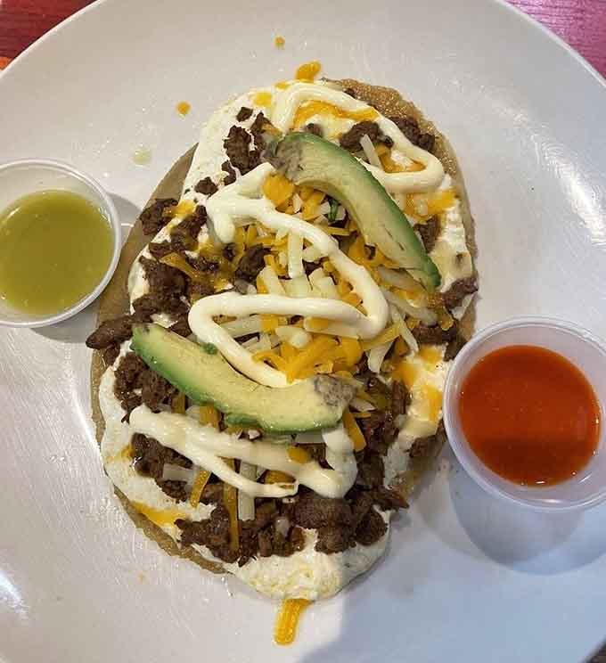 The huarache steak sits atop its oval base like edible architecture, substantial and seriously delicious in equal measure.