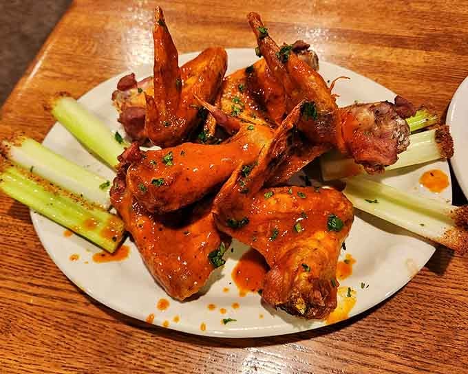 Chicken wings glazed to perfection, served with celery sticks that will absolutely be ignored by most diners.