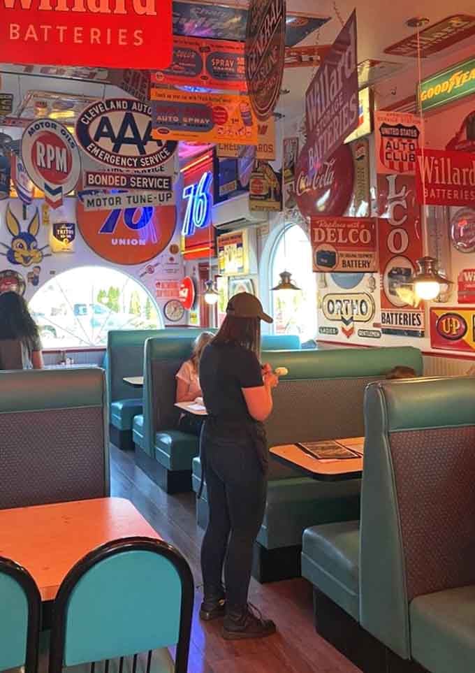 Step into a nostalgic wonderland at this iconic local spot where vintage signs and friendly faces make everyone feel welcome.