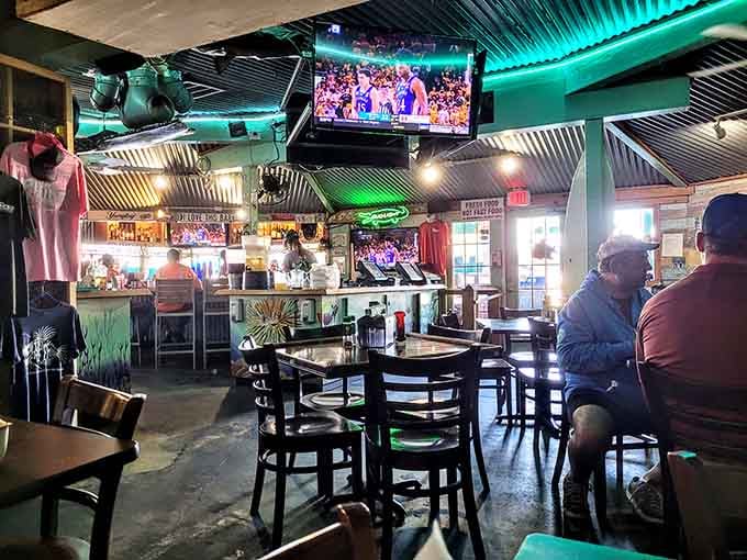 Diners fill the space under TVs and nautical decor, all united in their pursuit of exceptional seafood.