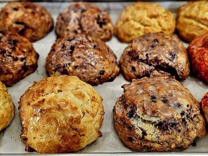 These scones come in multiple flavors because apparently someone understood that variety is the spice of breakfast life.