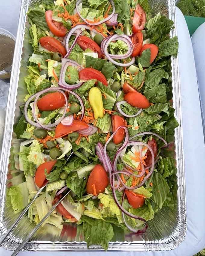 A salad so fresh and colorful, it almost makes you forget about the pasta coming next.