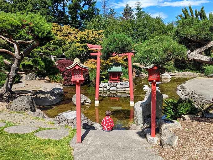 The Japanese garden section brings zen tranquility with its distinctive red torii gate and peaceful pond.
