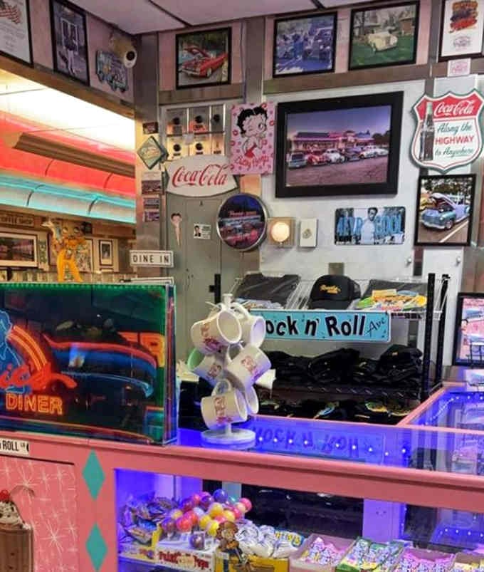 Merchandise corner featuring everything from vinyl records to vintage toys, because why stop at just feeding you?