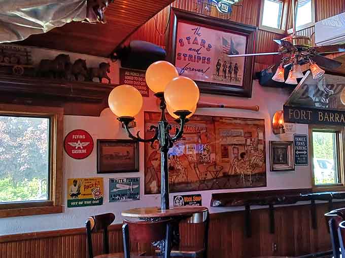 Vintage signs and antique lamps create an atmosphere that feels like dining in America's most interesting basement rec room.