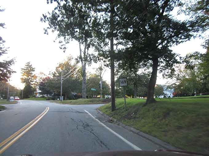 Intersections along Route 169 feel less like traffic decisions and more like choosing your own New England adventure.