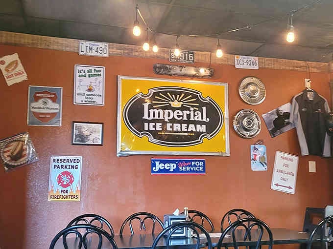 Vintage signs and automotive nostalgia cover the walls, celebrating America's love affair with the open road and good eating.