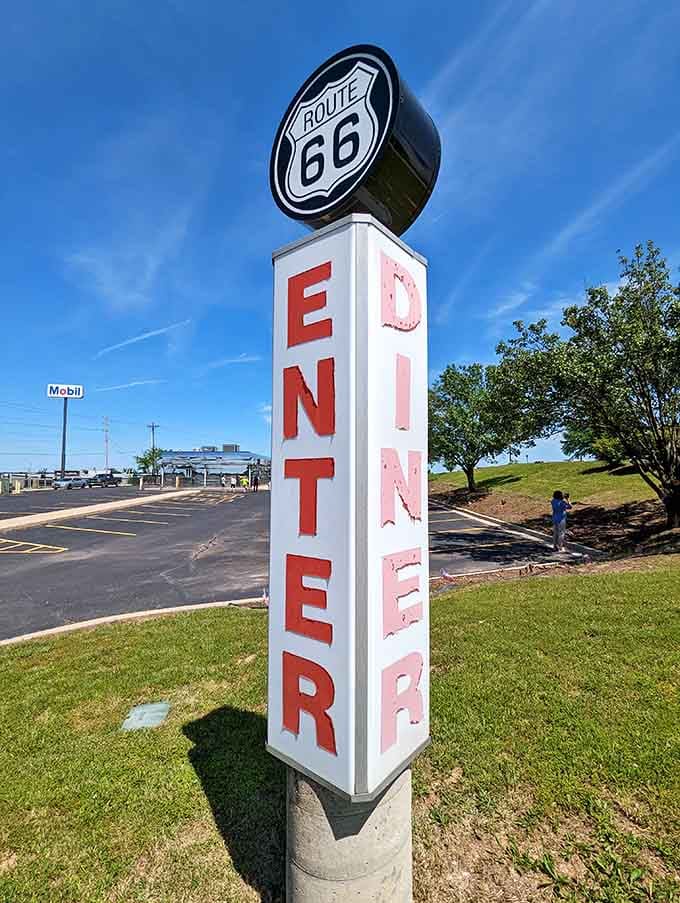 That Route 66 sign stands tall like a beacon guiding hungry travelers to breakfast salvation.