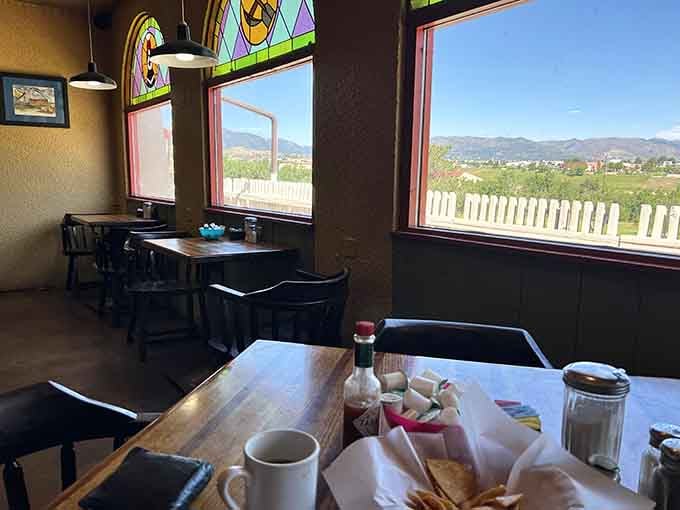 Window seats offer mountain views while you enjoy your meal, combining natural beauty with culinary pleasure.